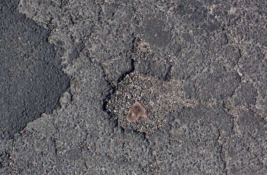 Road Pothole Texture Waterfilled Pothole on Asphalted Road Stock Photo ...